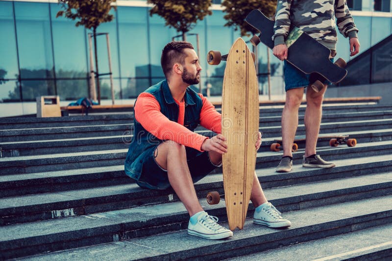 Two Urban Males Posing with Longboard. Stock Photo - Image of enjoyment ...
