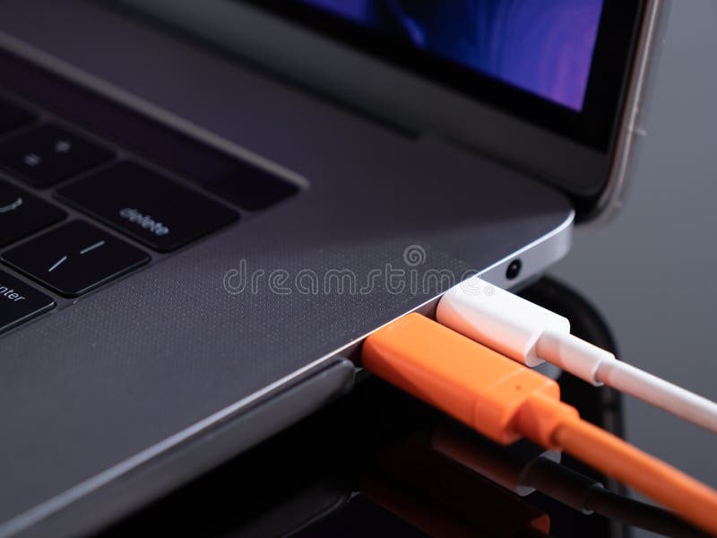 USB Type C Cable Being Connected To the Laptop Computer. Fast Charging ...