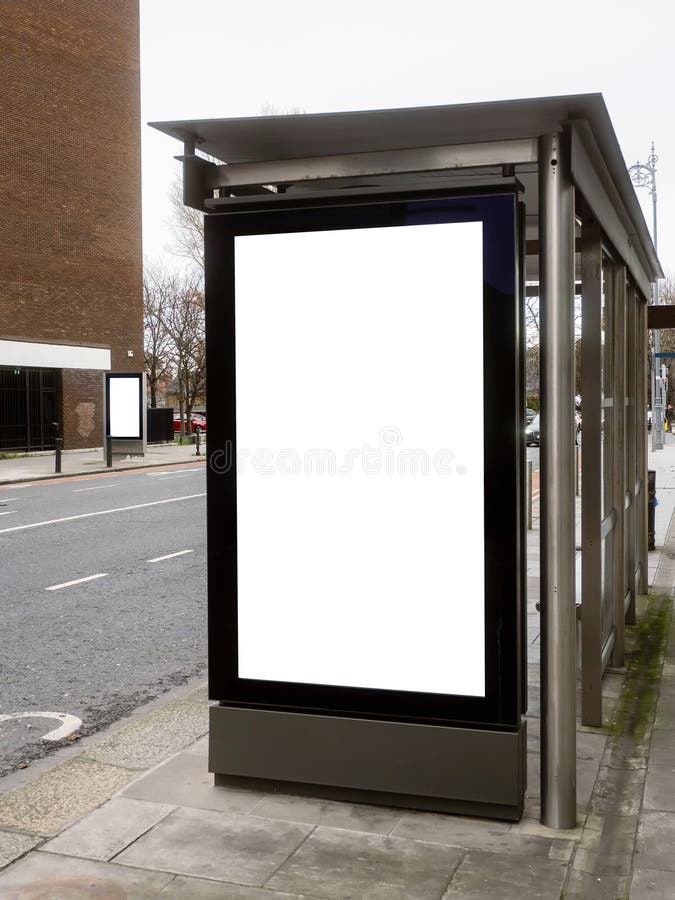 Two Vertical Advertisement Boards on a Bus Stop Stock Photo - Image of ...