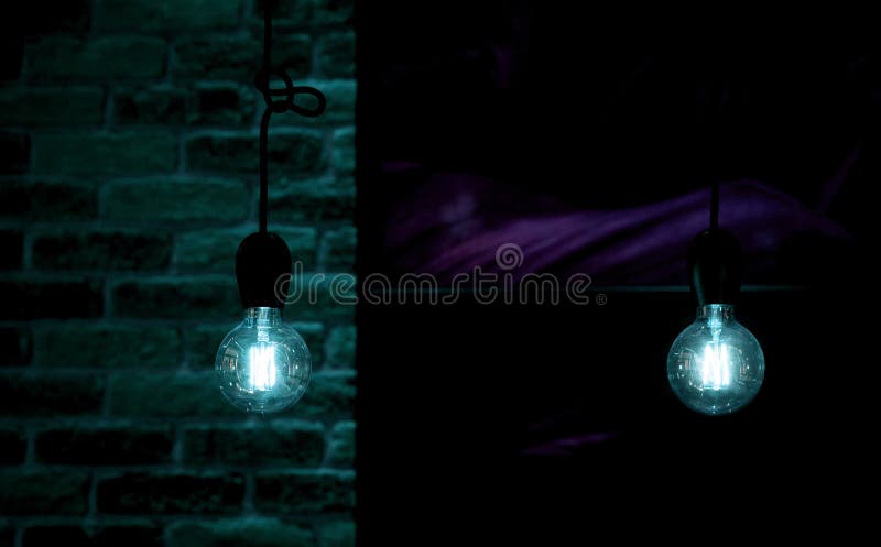 Two Vintage Hanging Light Bulbs Stock Image - Image of electricity ...
