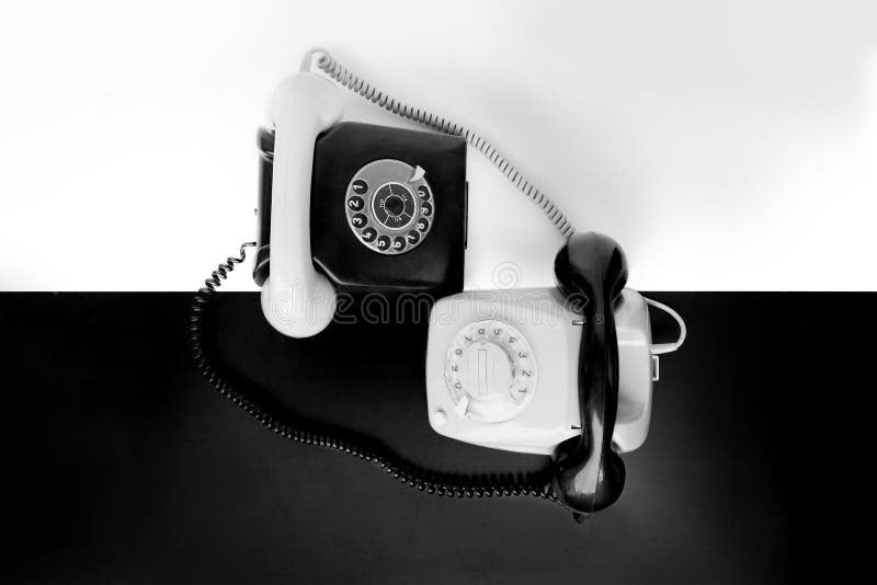 Two Vintage Telephone Sets with Dial in Retro Style on a Black, White ...
