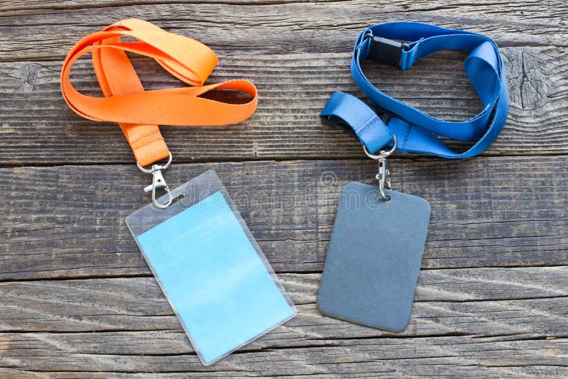 Two Vip Id Cards with Tags on Wooden Background Stock Image - Image of ...