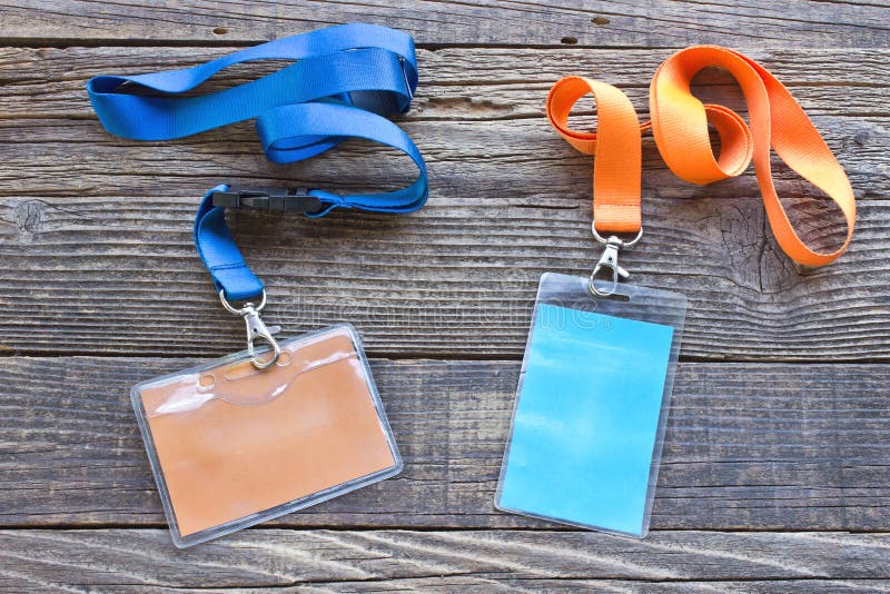Two Vip Id Cards with Tags on Wooden Background Stock Photo - Image of ...