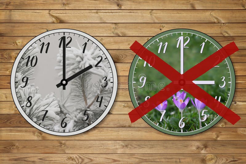 Two Wall Clocks, One is Marked with a Red Cross. No Daylight Saving ...