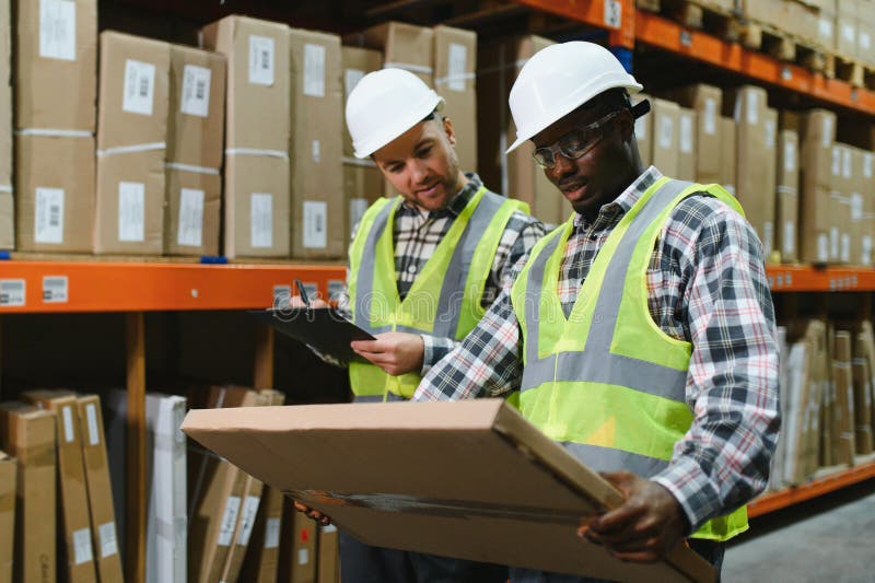 Two Warehouse Workers. Logistic and Business Export Concept Stock Photo ...