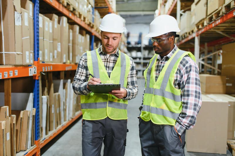 Two Warehouse Workers. Logistic and Business Export Concept Stock Photo ...
