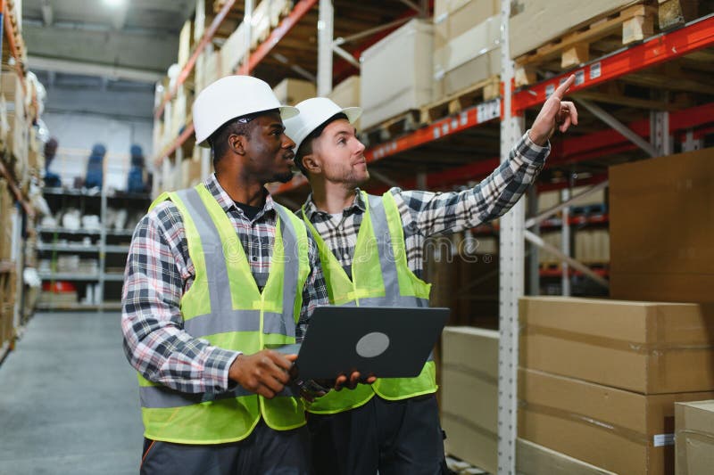 Two Warehouse Workers. Logistic and Business Export Concept Stock Photo ...
