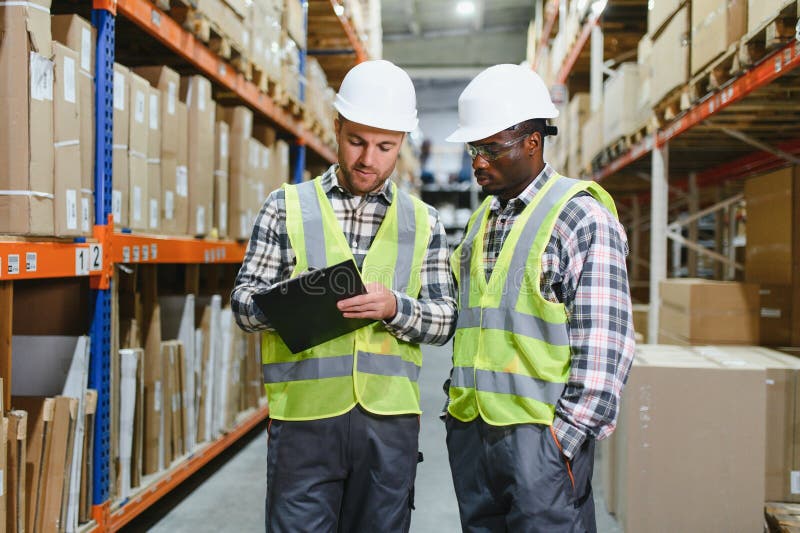 Two Warehouse Workers. Logistic and Business Export Concept Stock Photo ...