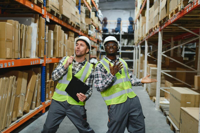 Two Warehouse Workers. Logistic and Business Export Concept Stock Photo ...