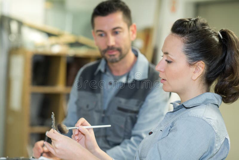Two Warehouse Workers Smiling and Holding Tablet Stock Image - Image of clipboard, shipment ...
