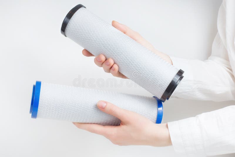 Two Water Filter Cartridges in Human Hands Stock Image - Image of ...