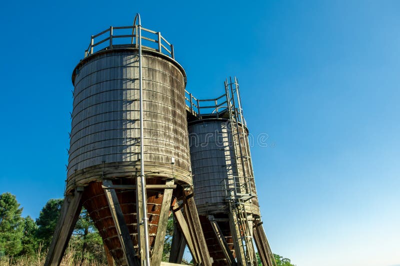 Two Water Tanks Isolated with Blue Sky Stock Image - Image of mast ...