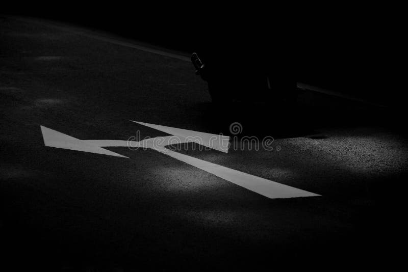 Two Way Arrow Signs on the Asphalt Road. Stock Image - Image of arrow ...