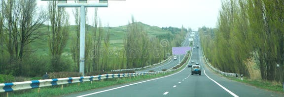 Two-way Highway in the Evening Stock Photo - Image of driving, blue ...
