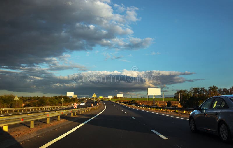 Two Way Highway Traffic in Sunset with Cars Stock Image - Image of ...