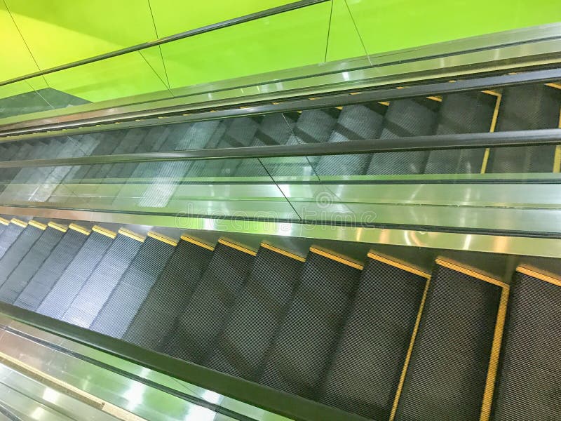 Two way modern escalator stock photo. Image of metal - 111163078