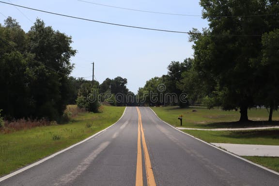 Two-way Road Divided by Two Yellow Solid Lines. Two Lane Road Stock ...