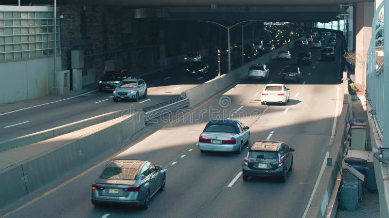Two Way Traffic Passing through Underpass on Freeway Stock Footage ...