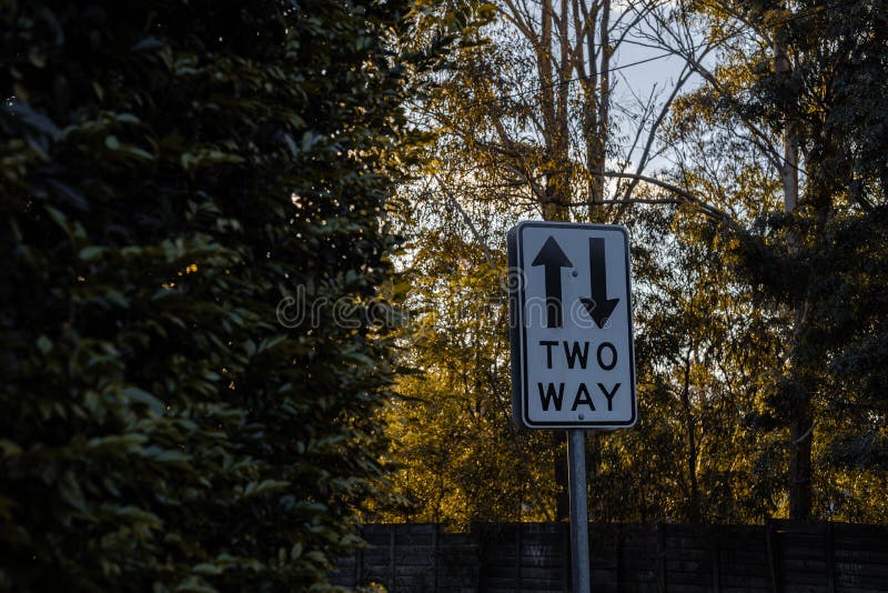 A two ways sign on a road stock image. Image of floor - 266009543