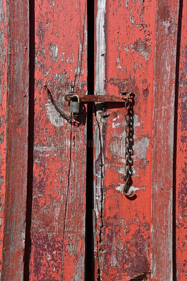 Two Weathered Red Doors with Rusty Latch Arepadlocked Stock Photo ...