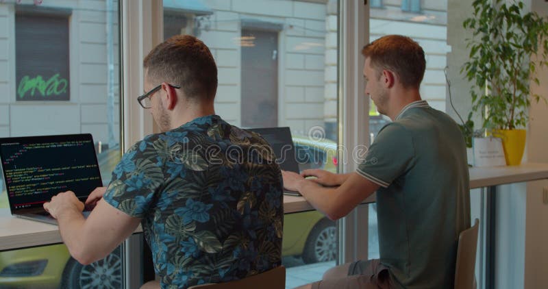 Two Web Developers Working at the Computer Inthe Modern Office. Stock ...