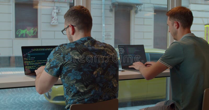 Two Web Developers Working at the Computer Inthe Modern Office. Stock ...