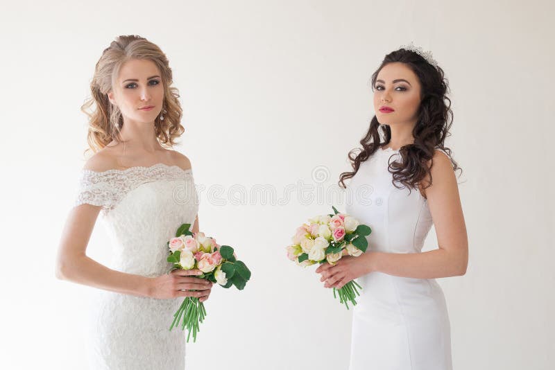 Two Wedding Bride with Bouquet Wedding Stock Photo - Image of fashion ...