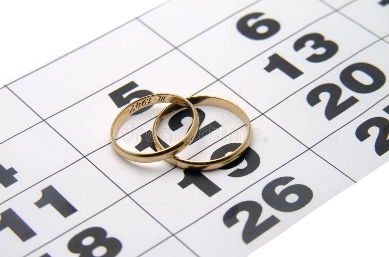 Two Wedding Ring On A Calendar Stock Photo - Image of bond, holy: 775464