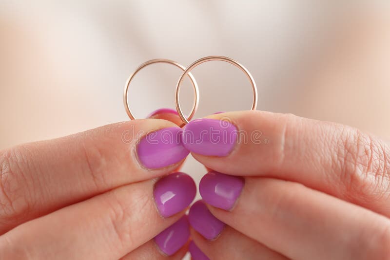 Two wedding ring in hand stock photo. Image of women - 93828068