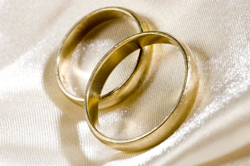 Two wedding gold rings stock image. Image of bright, bride - 24756065