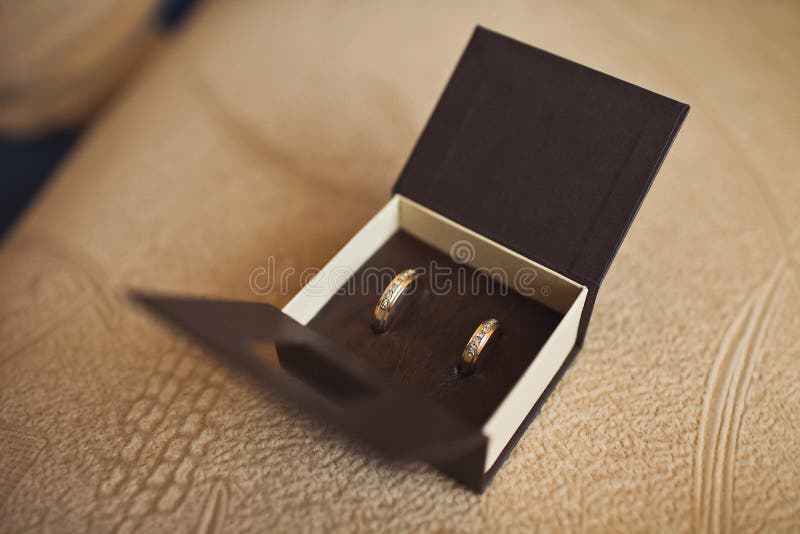 Two Wedding Rings in a Brown Box Stock Photo - Image of sacred, fashion ...