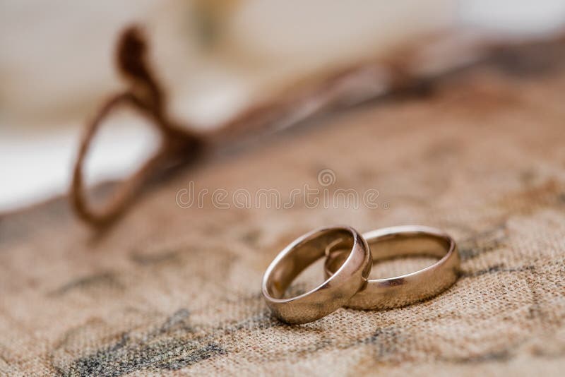 Two wedding rings stock photo. Image of paper, palms - 50951320