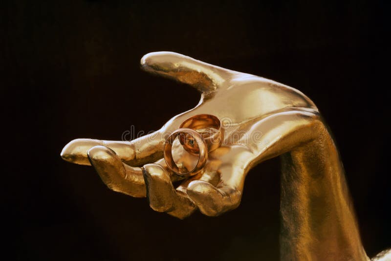 Two Wedding Rings in Gold Hand Stock Image - Image of black, beautiful ...