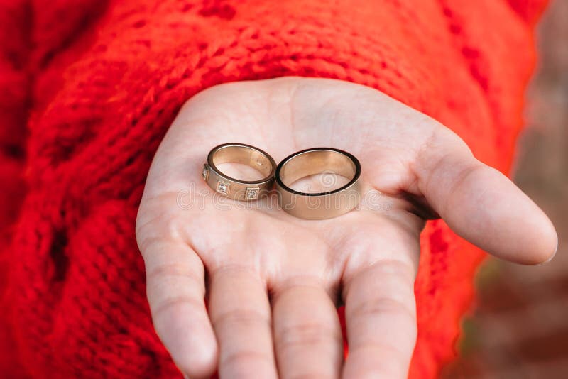 Two Wedding Rings in a Hand of the Bride Stock Photo - Image of groom ...