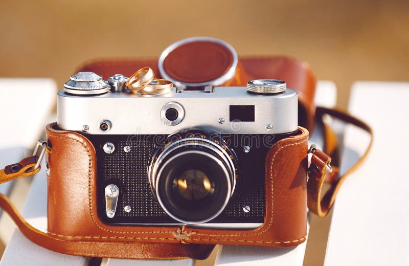 Two Wedding Rings on Old Camera Stock Image - Image of elegant, groom ...