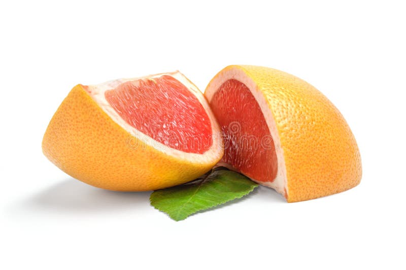 Two Wedges of Grapefruit on White Background with Green Leaf Stock ...