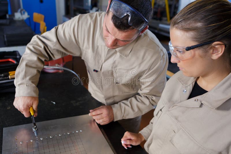 Two Welder Workers Assembling Parts Stock Photo - Image of component ...