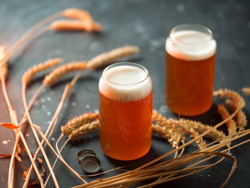 Two Wheat Beer on a Dark Table, Wheat Ears Stock Image - Image of ...
