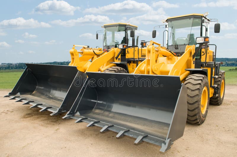 Two Wheel Loaders Excavators Stock Image - Image of building, bucket ...