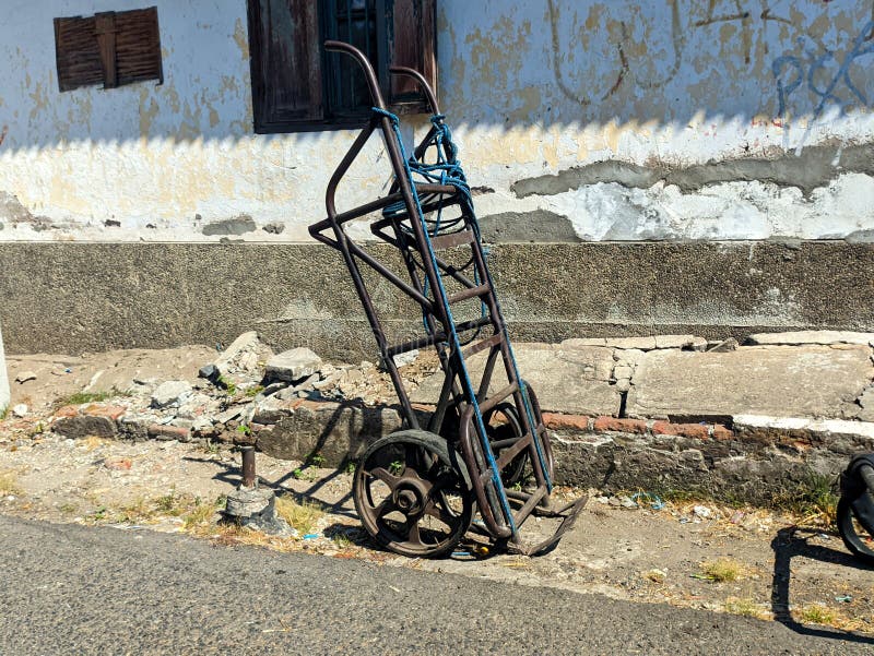 Two-wheeled Trolley To Carry Goods on the Side of the Road Stock Image ...