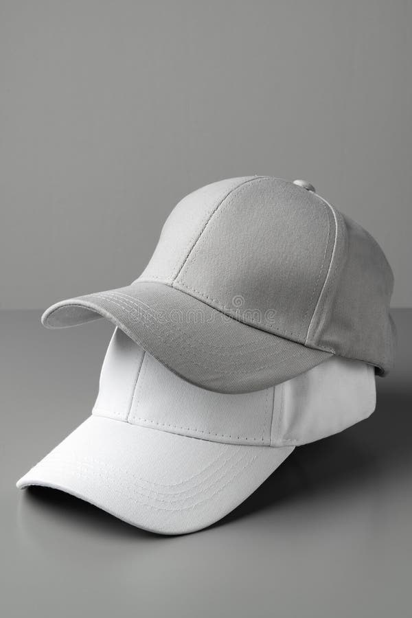 Two White Baseball Caps on a White Background Stock Image - Image of ...