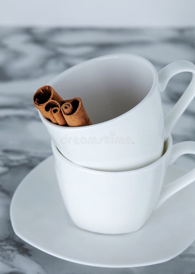 Two White Coffee Mugs on a White Saucer Side View Stock Photo - Image ...