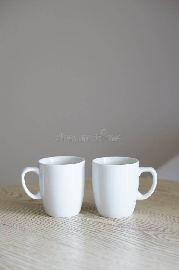 Two white cups stock photo. Image of cups, table, coffee - 90201536
