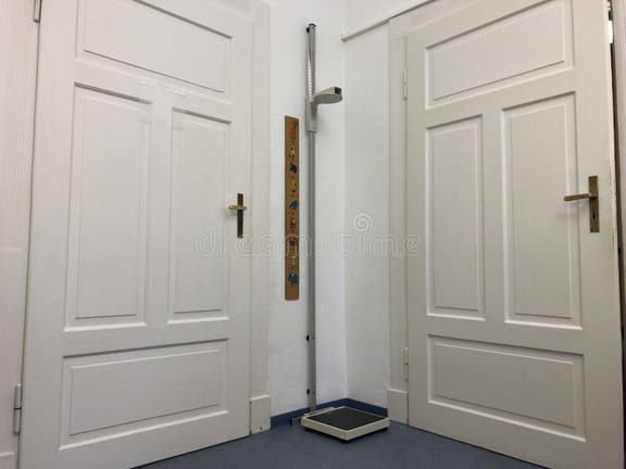 Two White Doors and a Height Meter Stock Image - Image of doorway ...