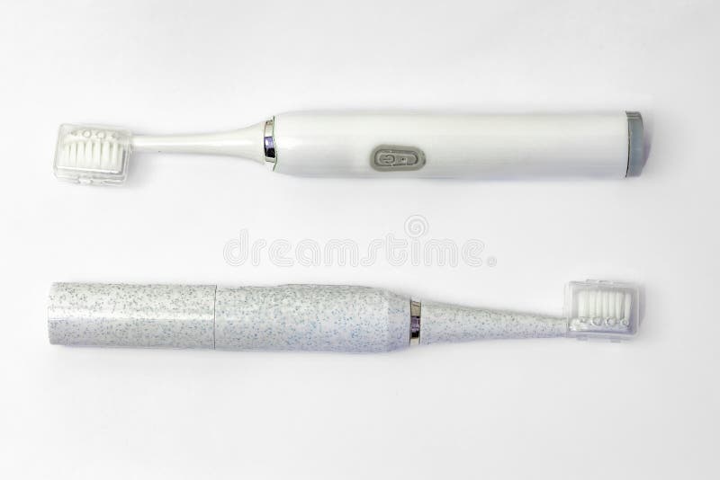 Two White Electric Toothbrushes Stock Photo - Image of tooth, clean ...