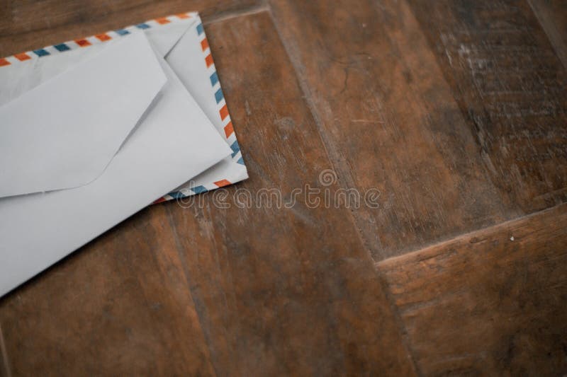 Two White Envelopes on a Wooden Table Stock Image - Image of pattern ...