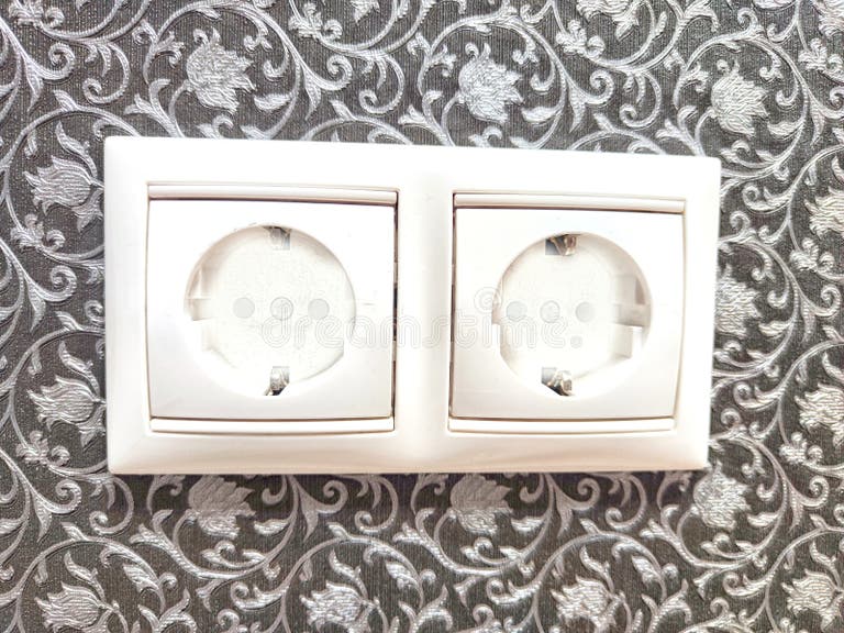 Two White European Power Outlets Mounted on Ornate Wall. European Dual ...