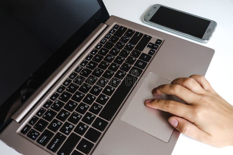 Two White Female Fingers Using Laptop Touchpad Gesture. Modern Home ...