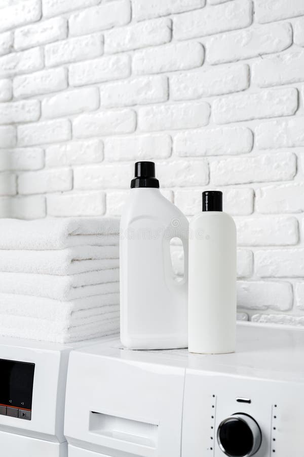 Two White Front Loading Washing Machines in Modern Laundry Room Stock ...