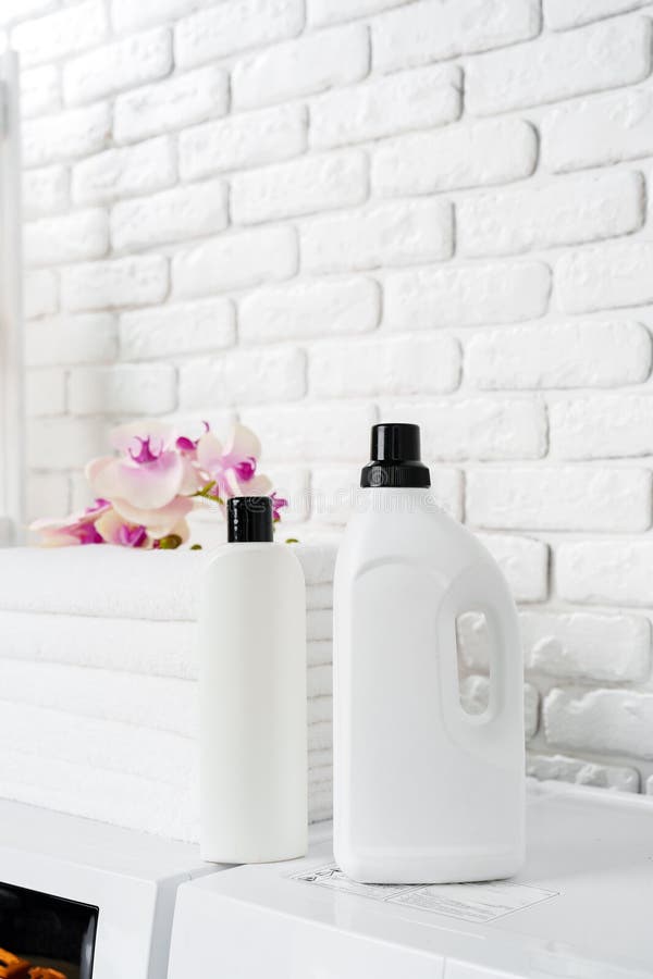 Two White Front Loading Washing Machines in Modern Laundry Room Stock ...